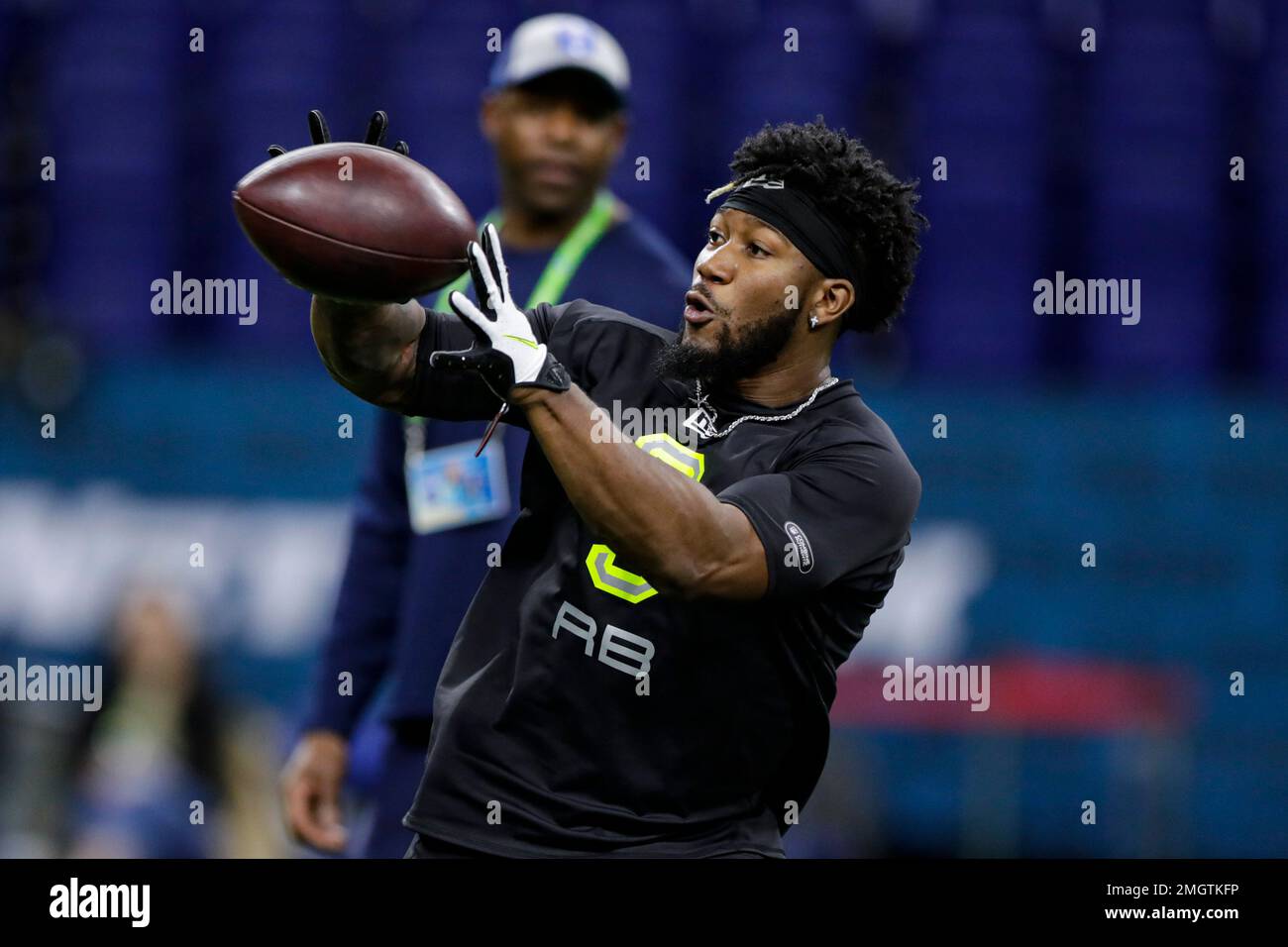 TCU running back Jet Anderson runs a drill at the NFL football scouting ...