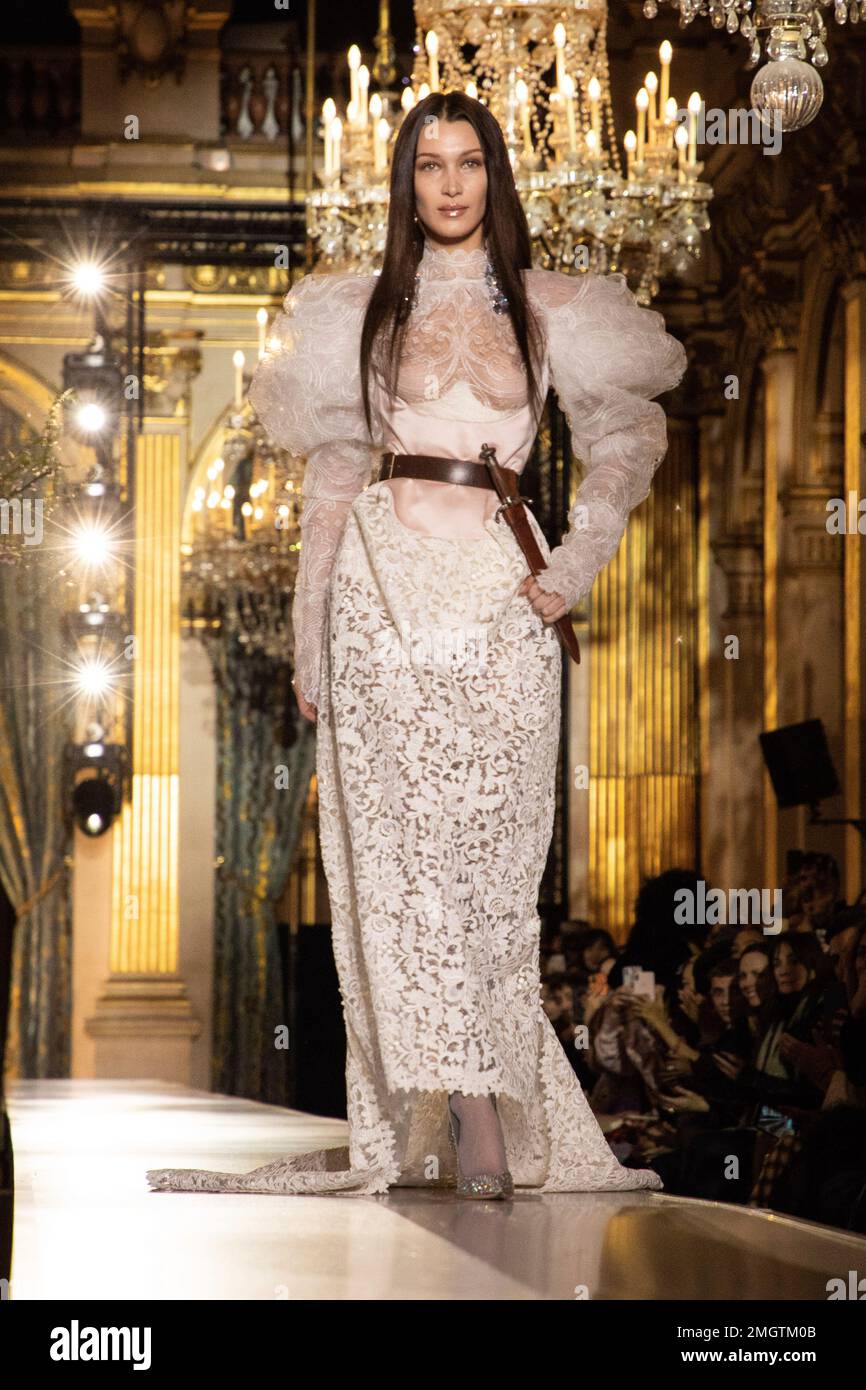 EDS NOTE: NUDITY - Model Bella Hadid wears a creation for the Vivienne ...