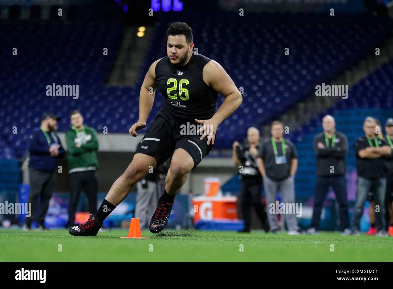Ohio State offensive lineman Jonah Jackson runs a drill at the NFL ...
