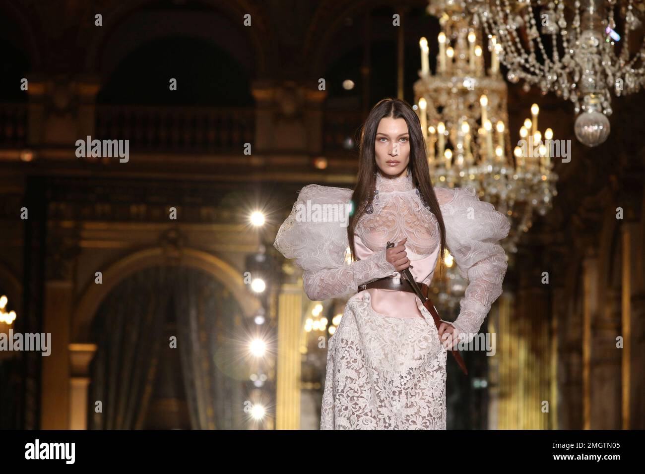 EDS NOTE: NUDITY - Model Bella Hadid wears a creation for the Vivienne ...