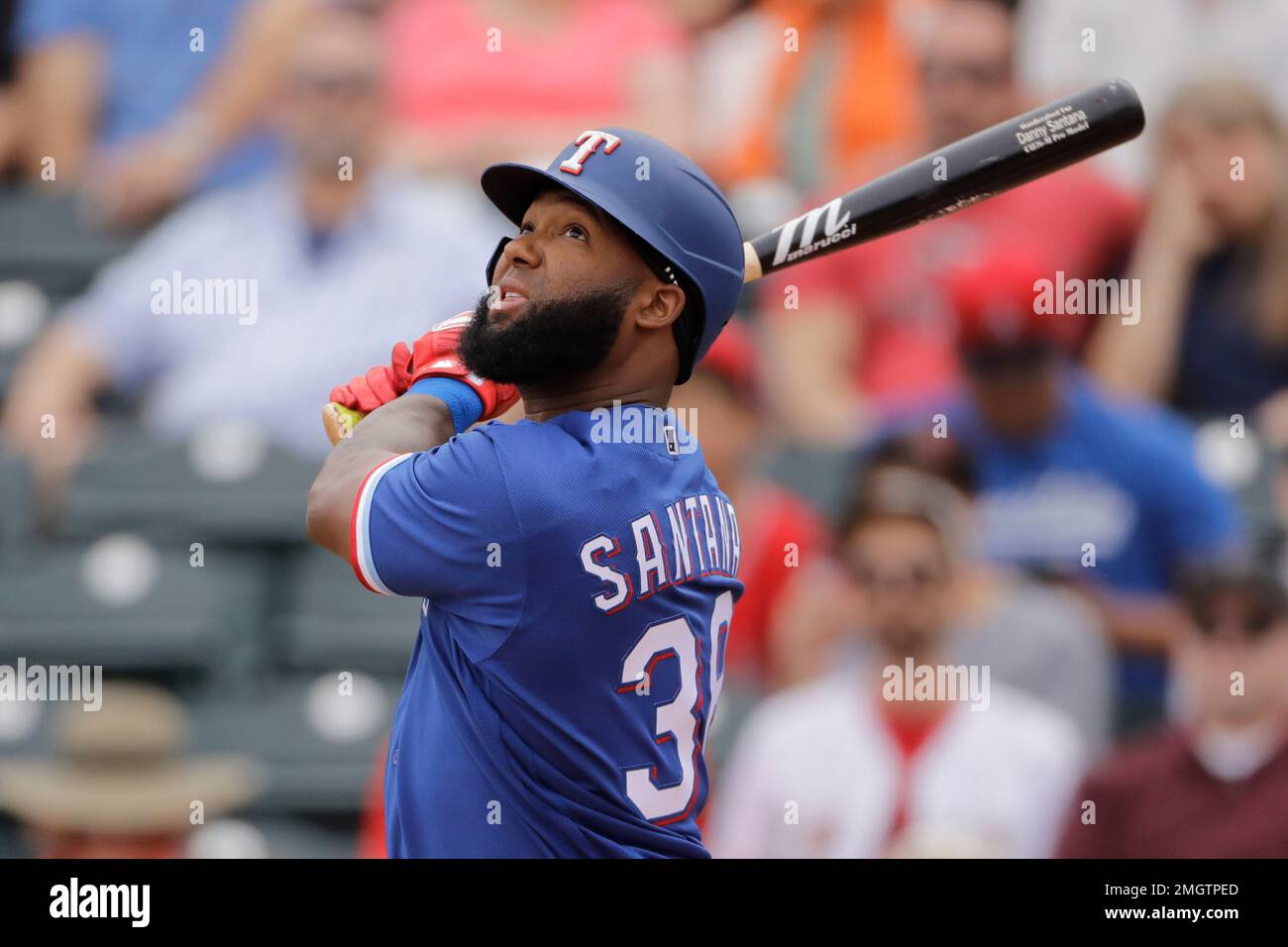 Texas Rangers' Danny Santana bats during the third inning of a spring ...