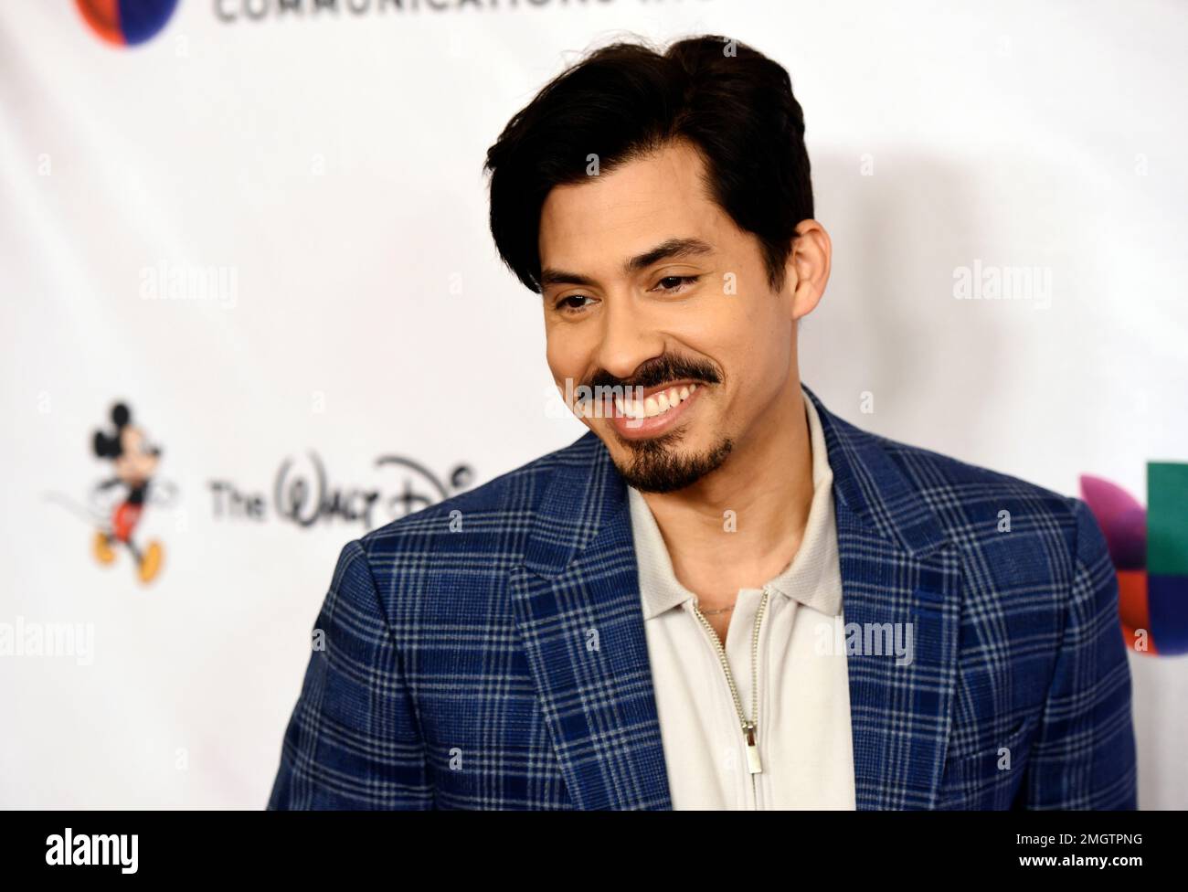 Actor Carlos Santos poses at the 2020 Impact Awards at the Beverly ...