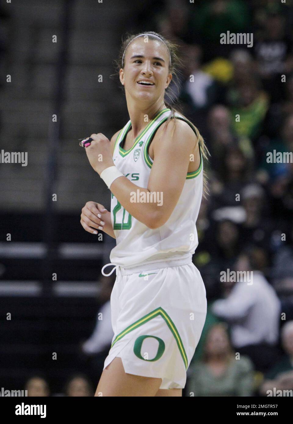 Oregon's Sabrina Ionescu smiles after a score during the first half ...
