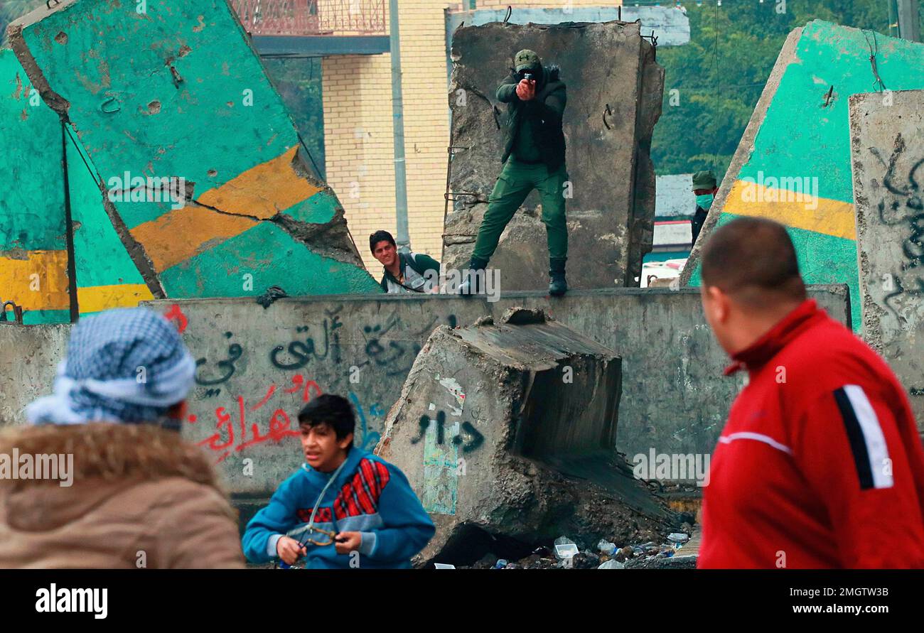 Security forces try to disperse anti-government protesters during ...