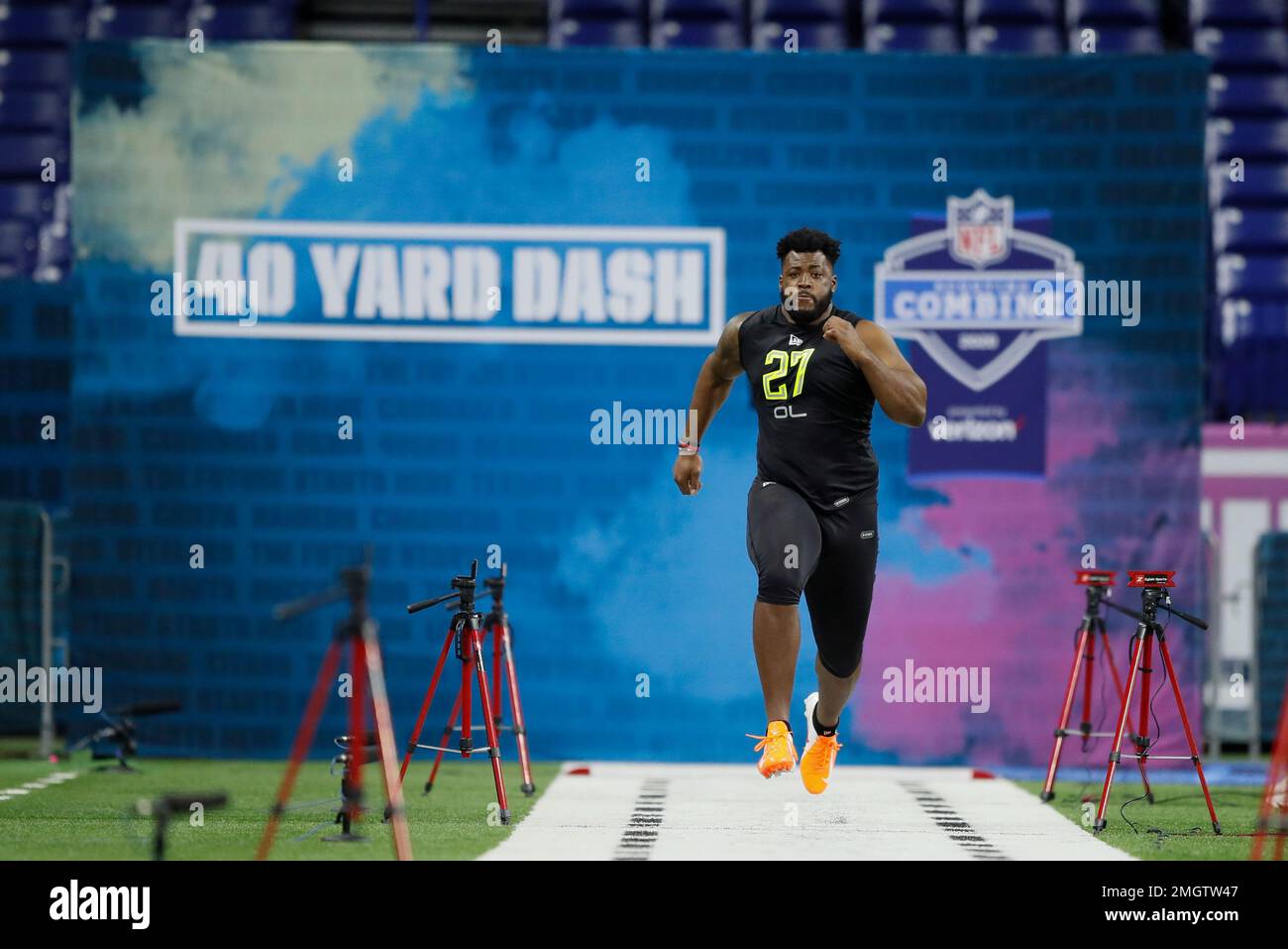 Houston offensive lineman Joshua Jones runs the 40-yard dash at the NFL ...