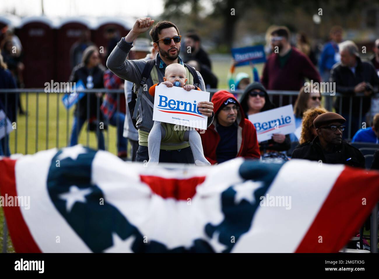 Attendees listen to speakers during a Democratic presidential candidate ...