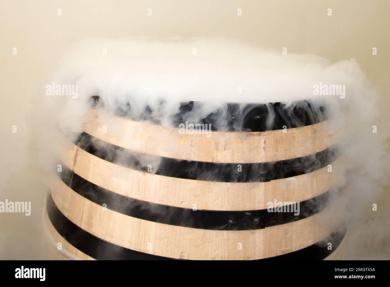 cellar smoke dry ice in harvest wood barrel for refresh grapes ...