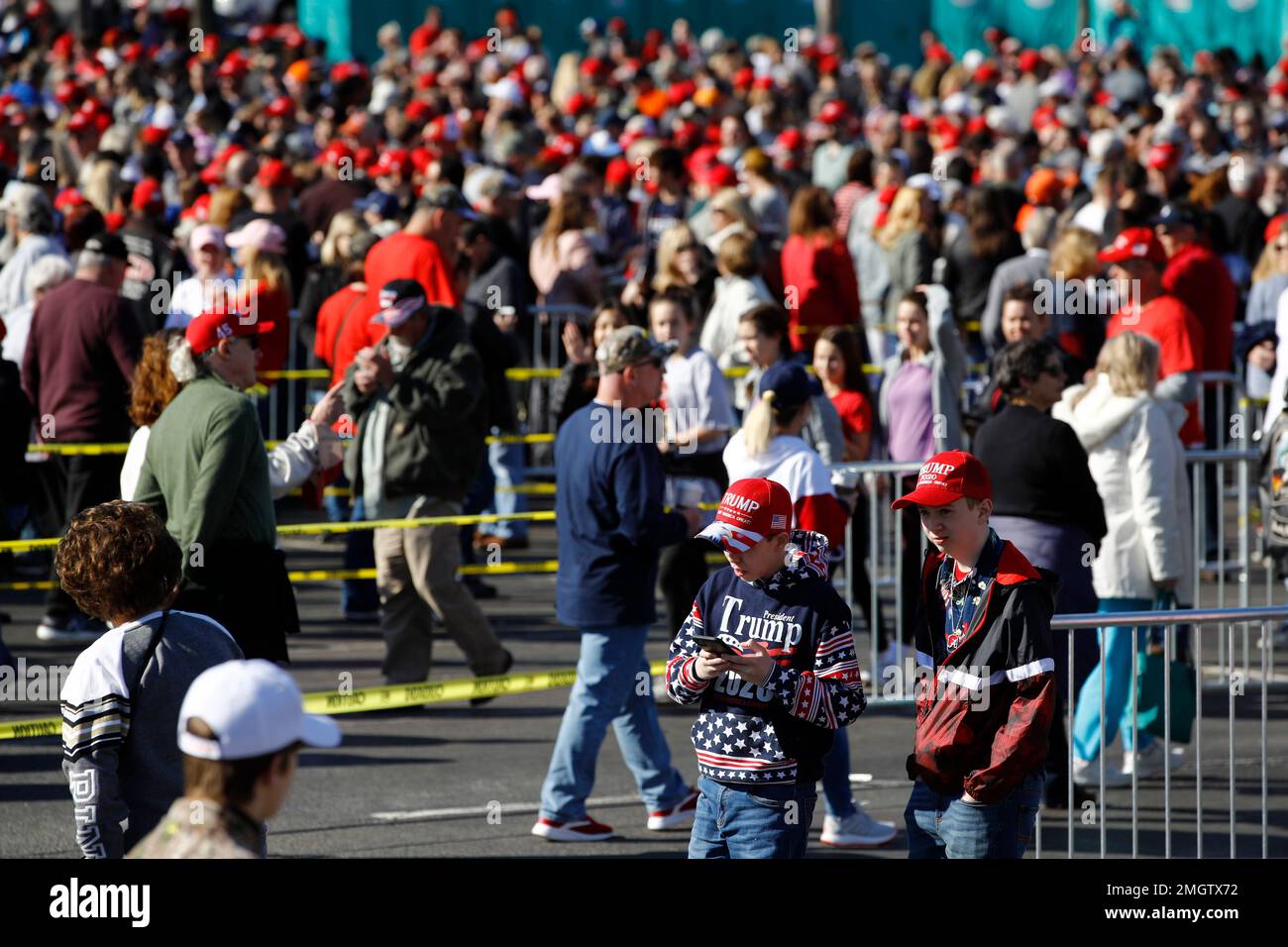 Attendees line up to attend a campaign rally for President Donald Trump ...