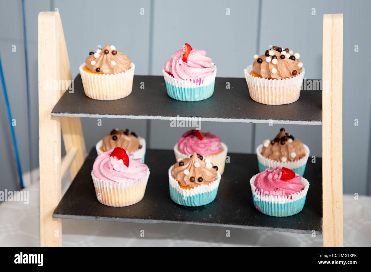 small cake Mini cupcakes decorated with spring and Easter candy ...
