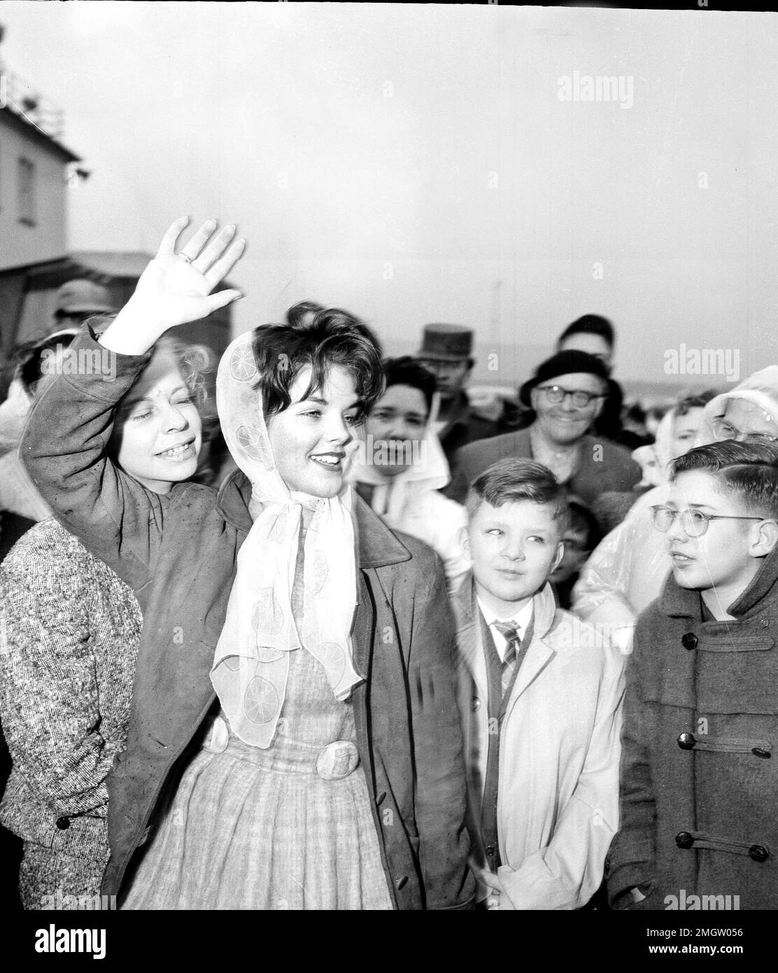 Sixteen-year-old Priscilla Beaulieu waves goodbye to Elvis Presley from ...