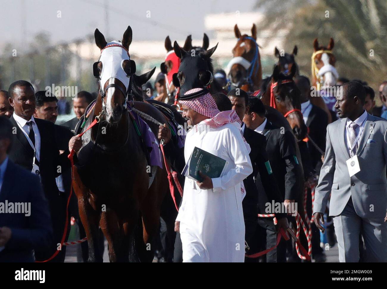 Horses are paraded before the start of $20 million horse race, the ...