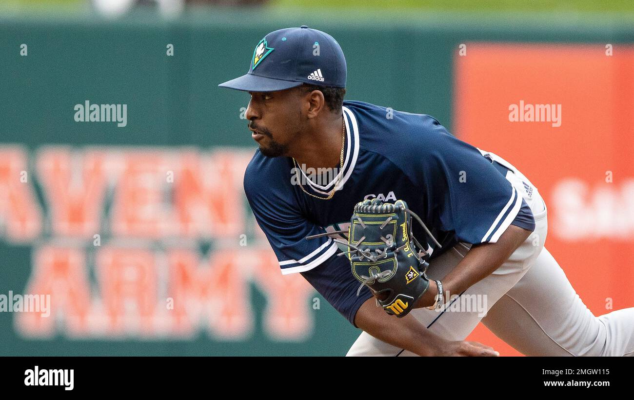 UNC Wilmington's Breydan Gorham (33) pitches during an NCAA baseball ...