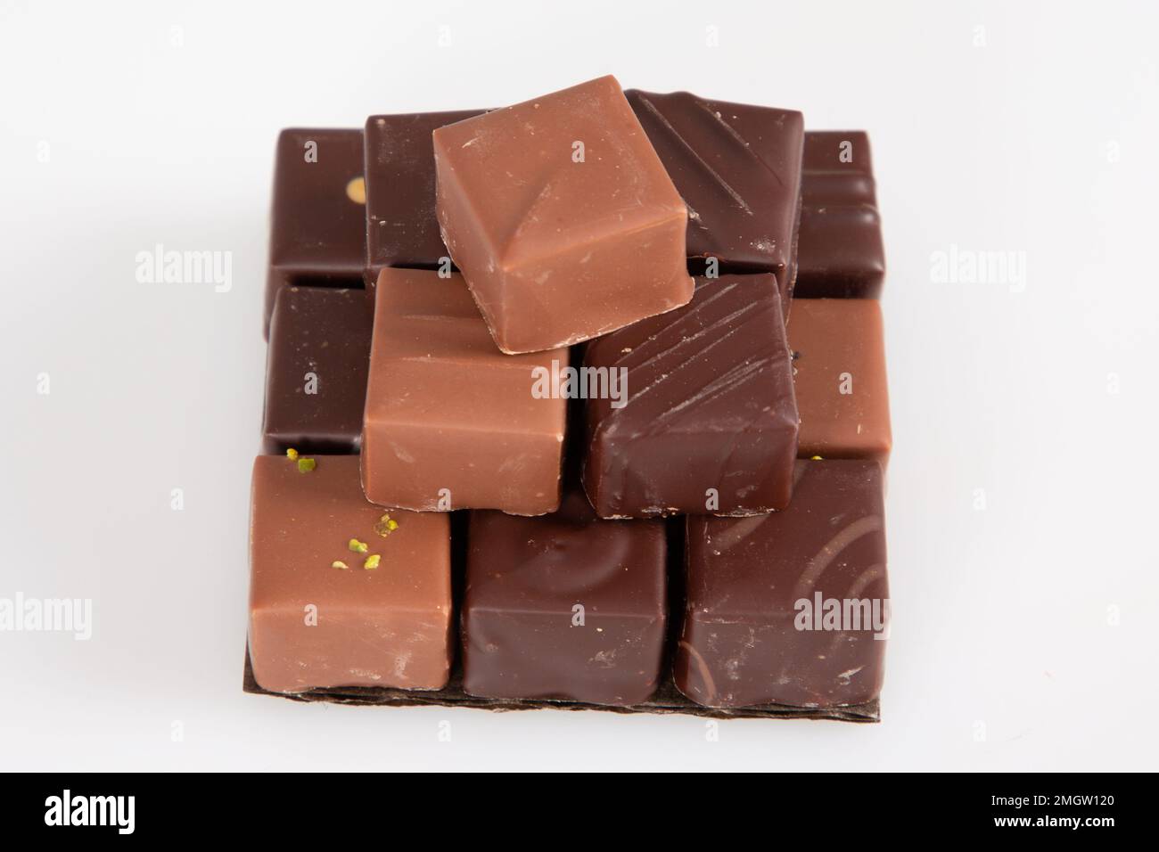 variety fine artisanal chocolate pralines in pyramid view in white ...