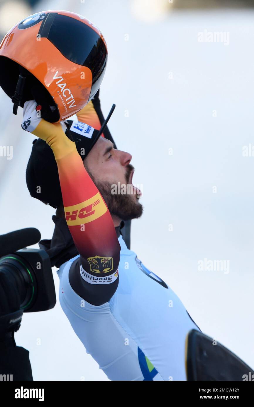 Axel Jungk from Germany celebrates his second place in the Skeleton ...