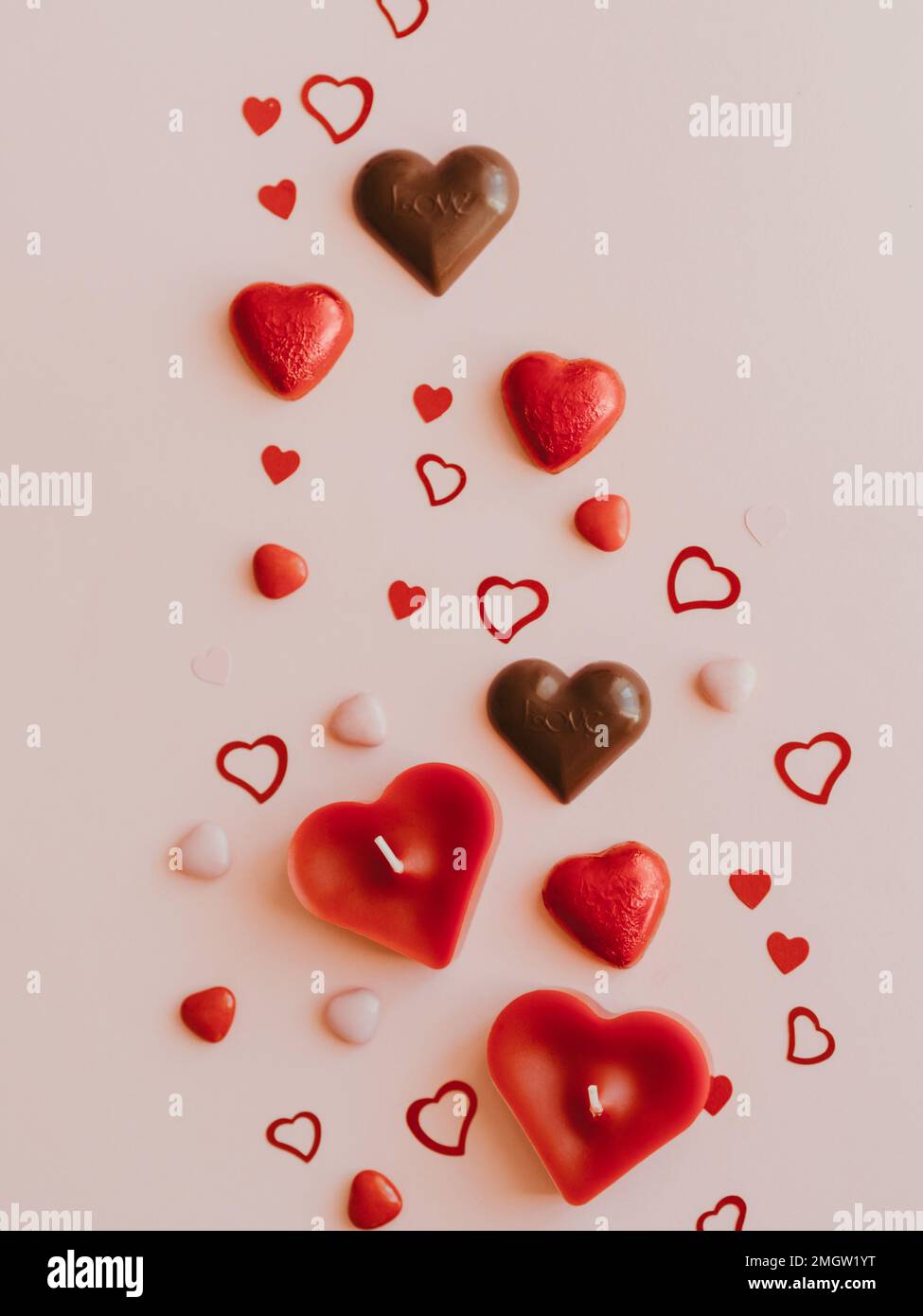 Pink valentines day background with different hearts - chocolate ...