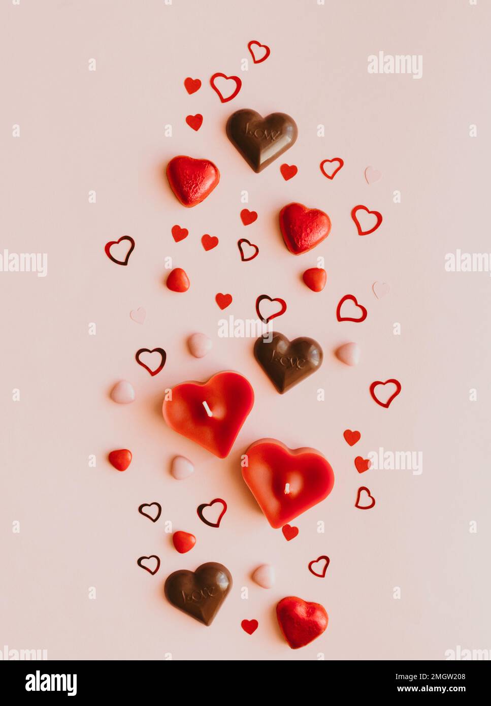 Pink valentines day background with different hearts - chocolate ...