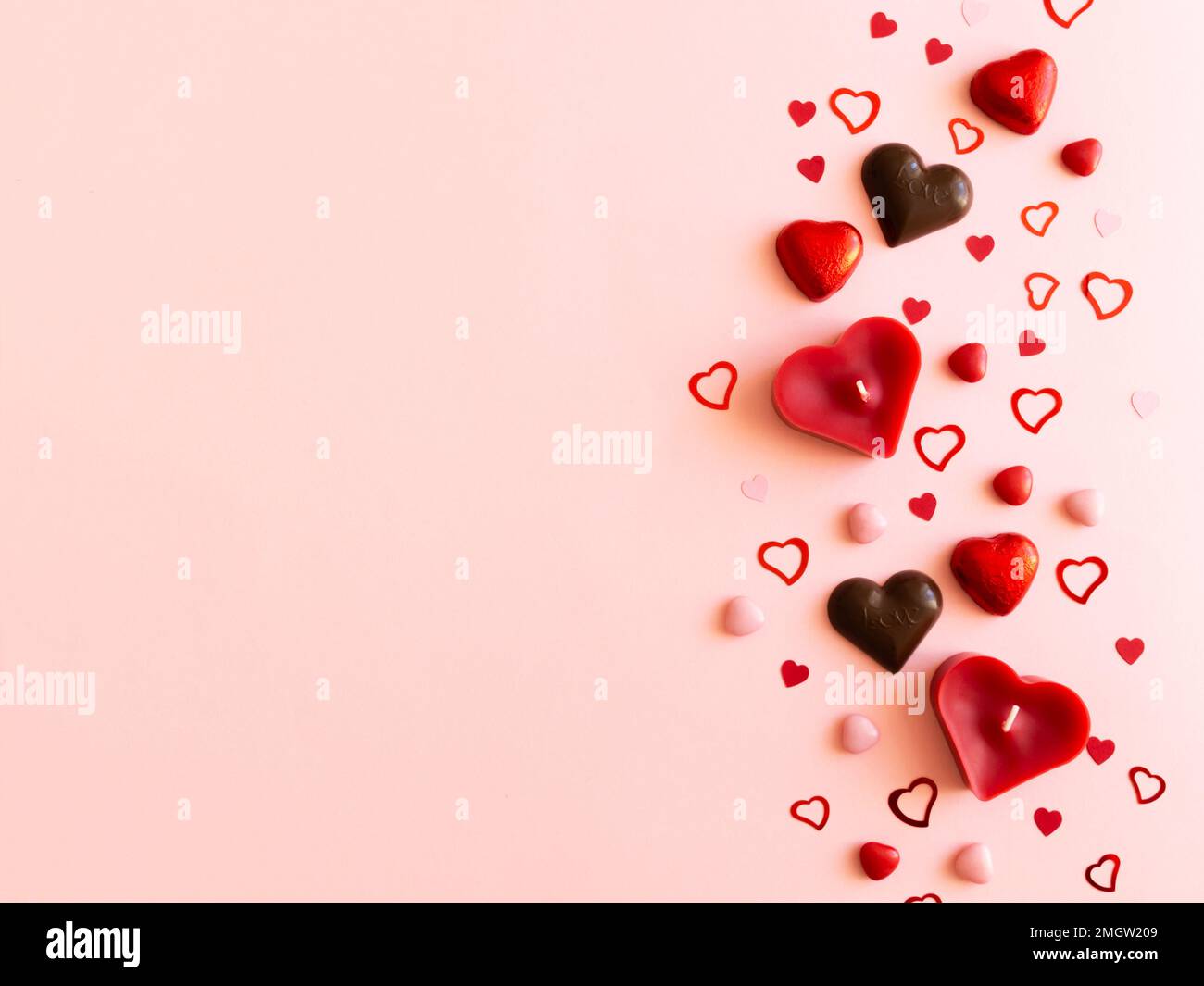 Pink valentines day background with different hearts - chocolate ...