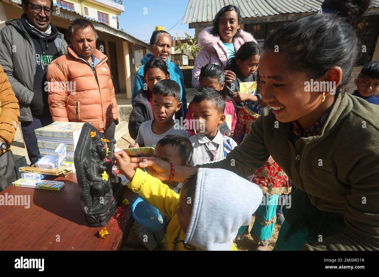 January 26, 2023: A child offers prayers to an idol of Goddess ...