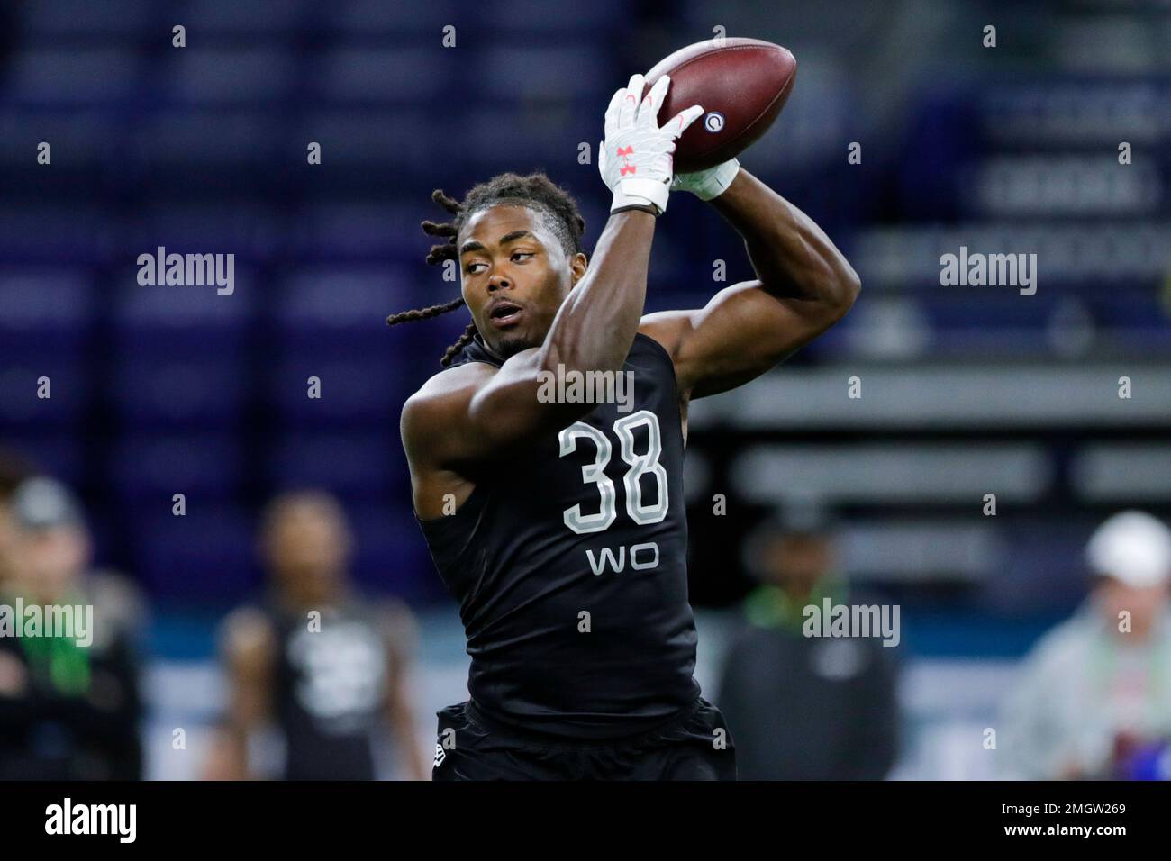 Miami wide receiver K J Osborn runs a drill at the NFL football ...
