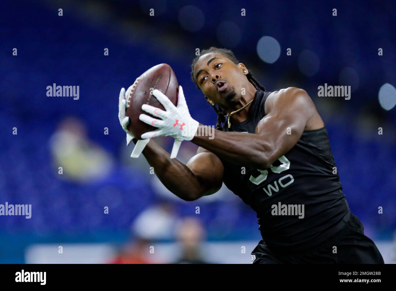 Miami wide receiver K J Osborn runs a drill at the NFL football ...