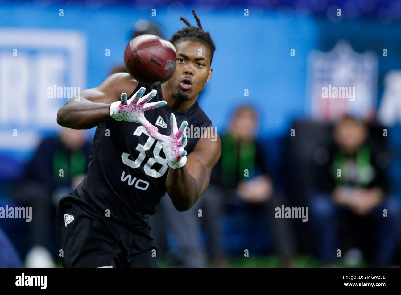 Miami wide receiver K J Osborn runs a drill at the NFL football ...