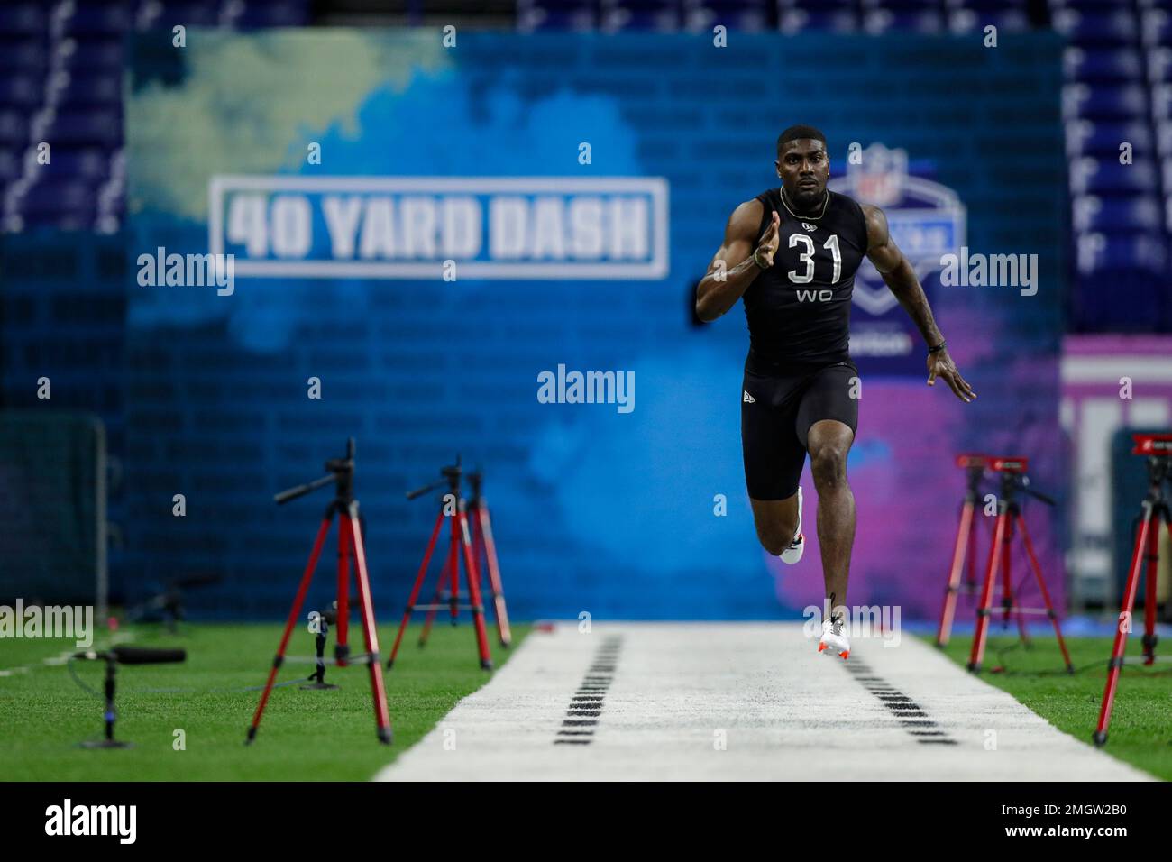 Oregon wide receiver Juwan Johnson runs the 40-yard dash at the NFL ...
