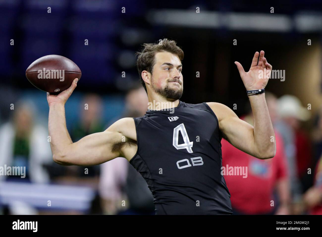 Washington quarterback Jacob Eason runs a drill at the NFL football ...