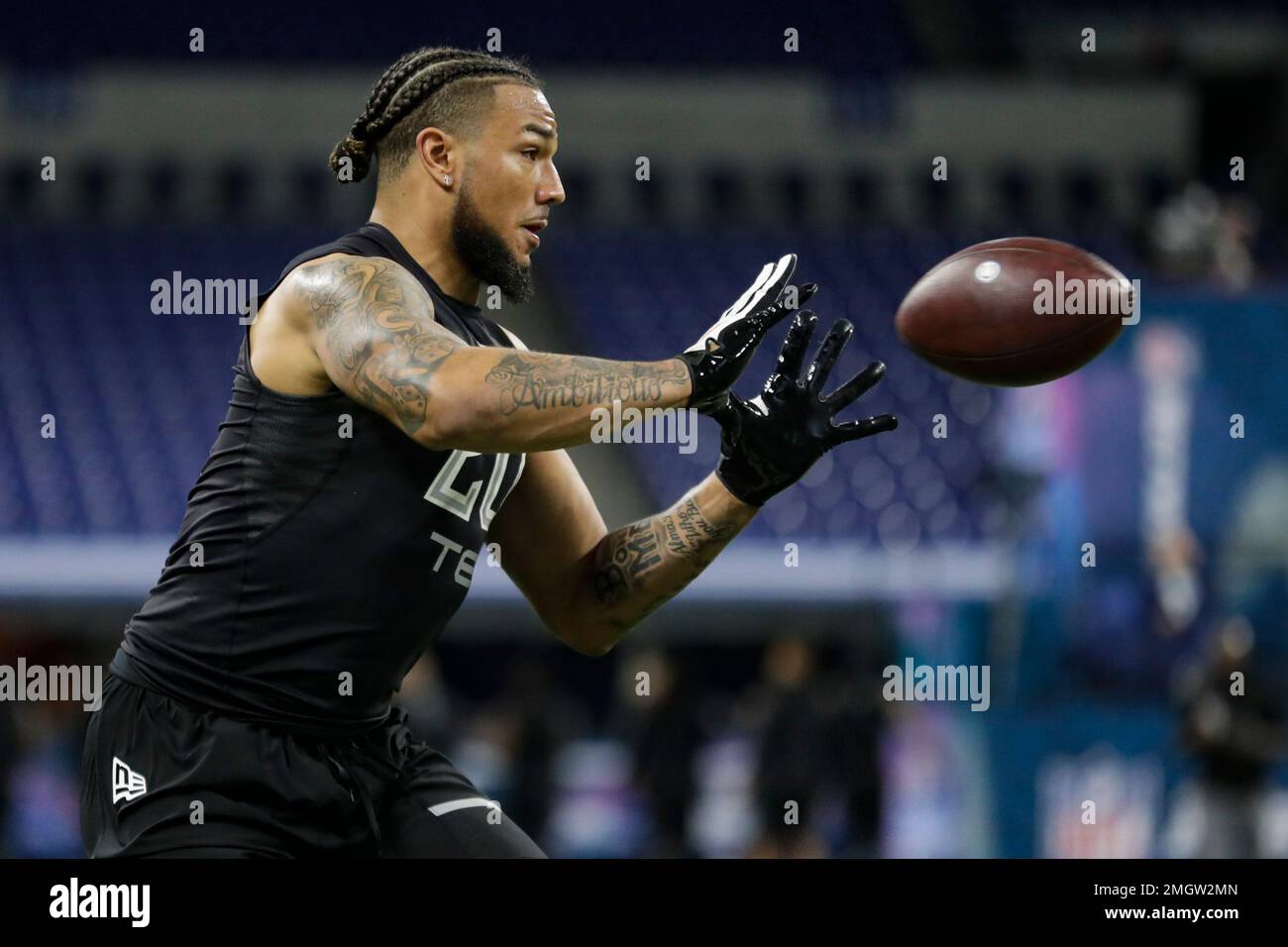 Tennessee tight end Dom Wood-Anderson runs a drill at the NFL football ...