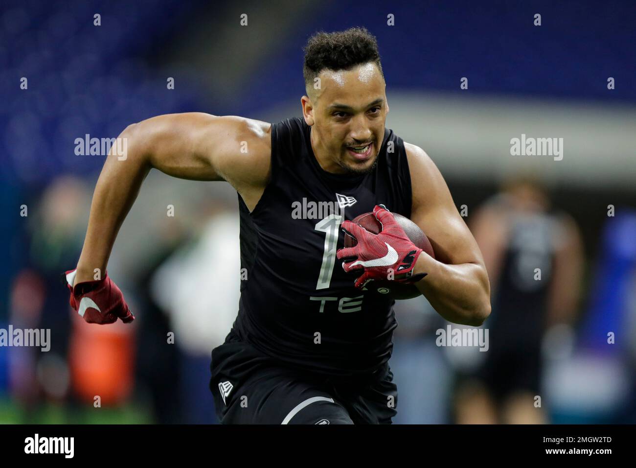 Arkansas tight end C J O'Grady runs a drill at the NFL football ...