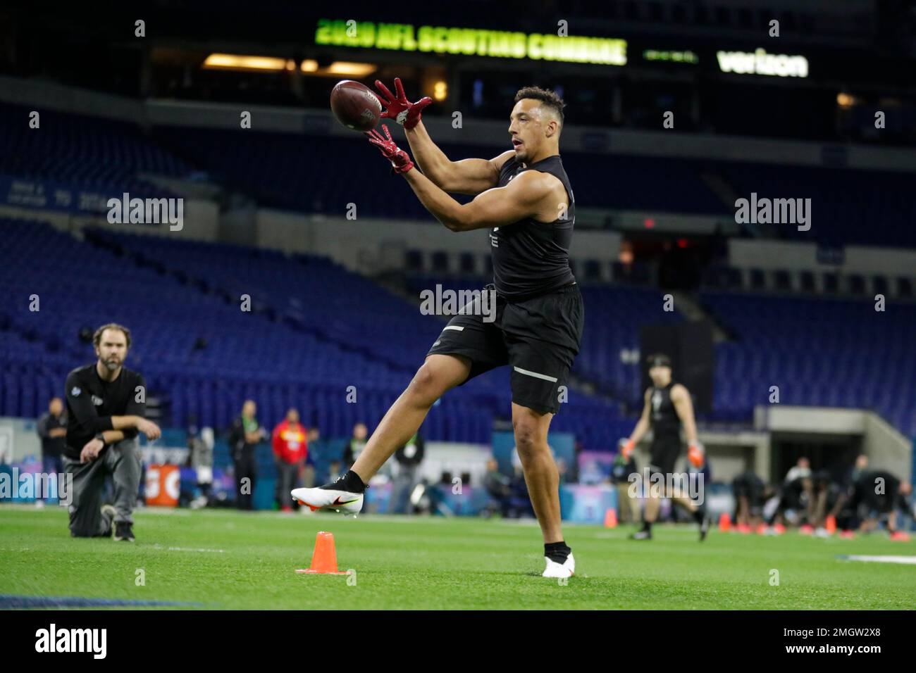 Arkansas tight end C J O'Grady runs a drill at the NFL football ...