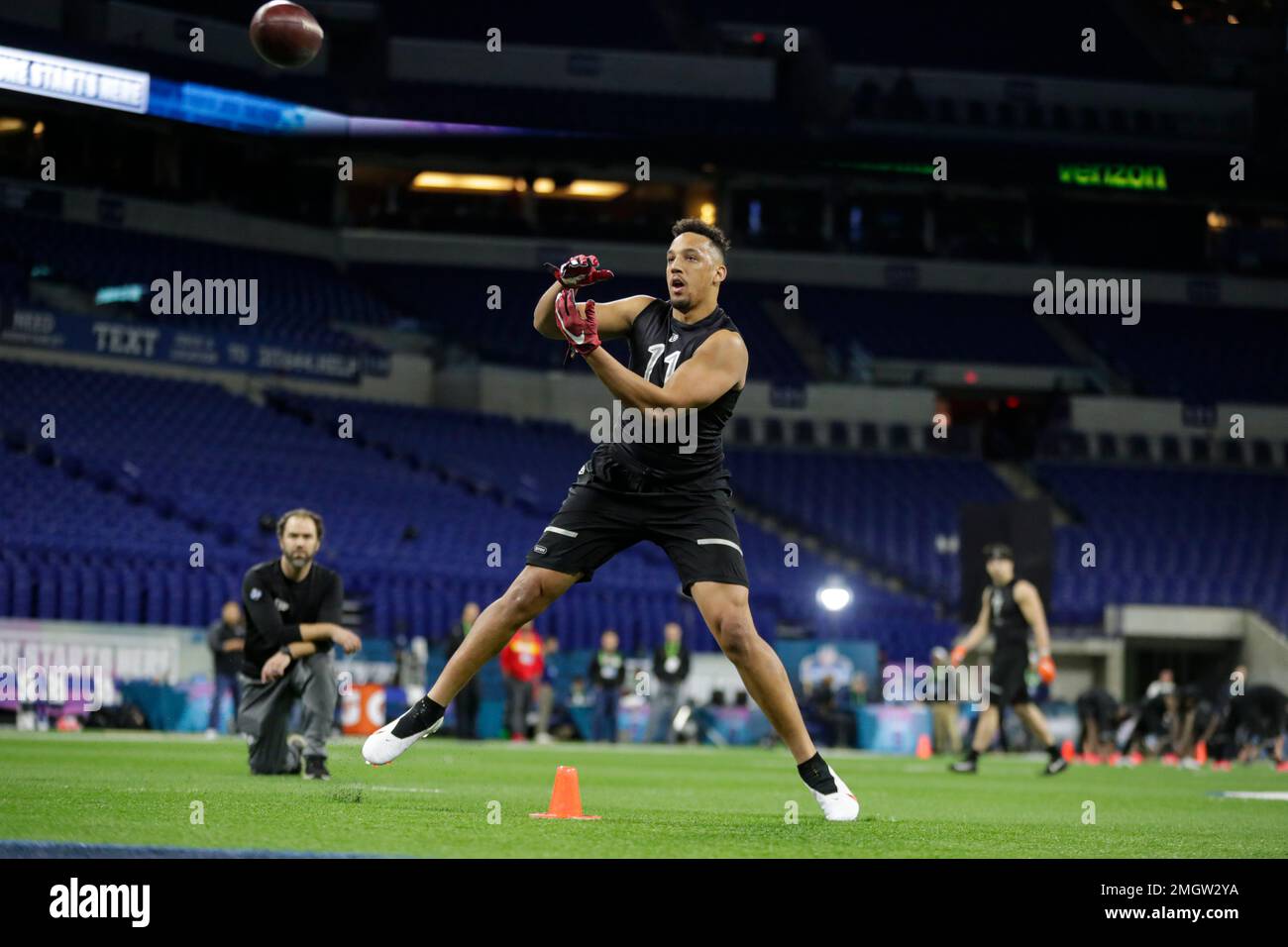 Arkansas tight end C J O'Grady runs a drill at the NFL football ...