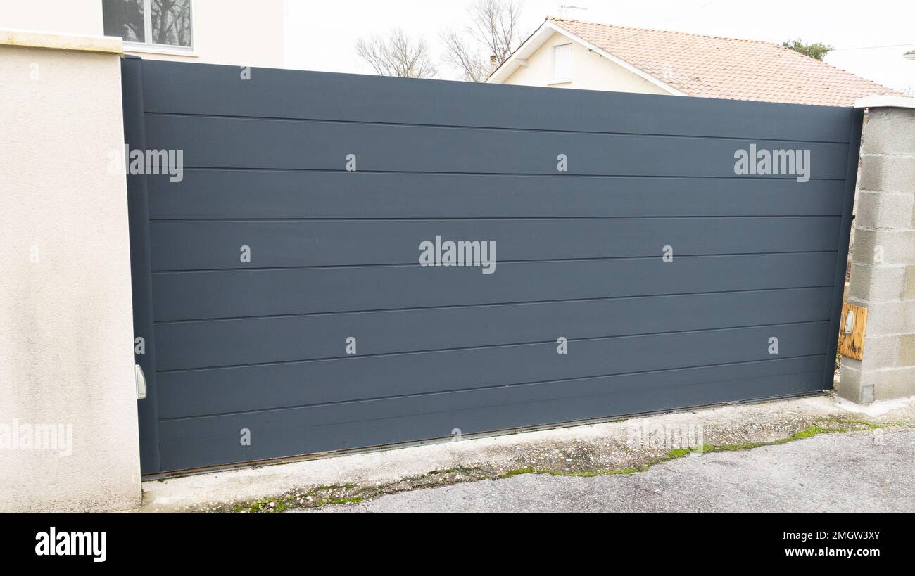 grey dark house steel sliding door aluminum gate at home entrance Stock ...