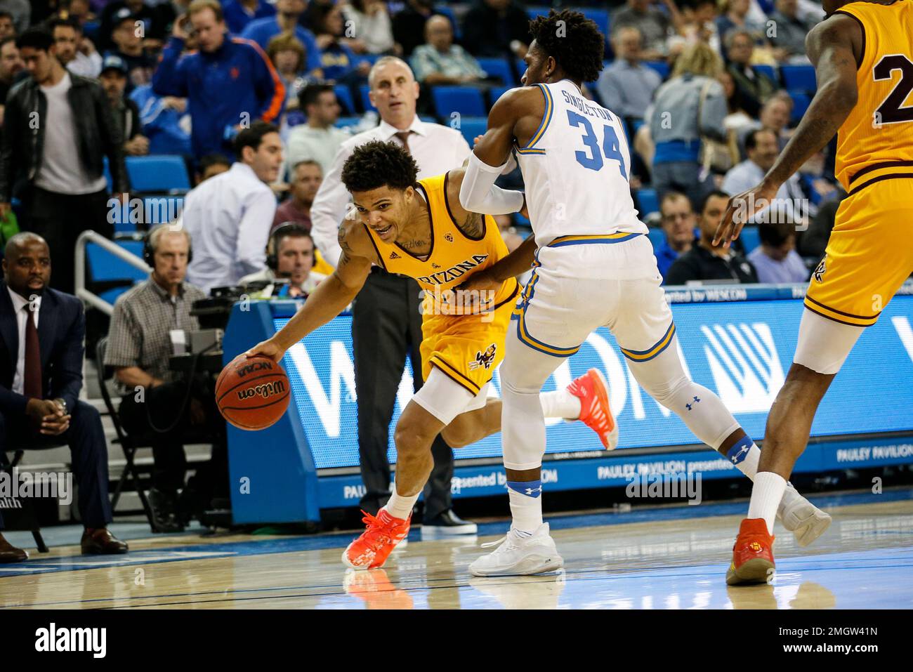 Arizona State guard Rob Edwards (2) drives against UCLA guard David ...