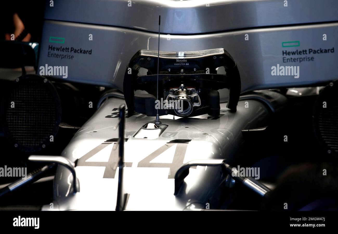 The steering wheel of Mercedes driver Lewis Hamilton of Britain sits ...
