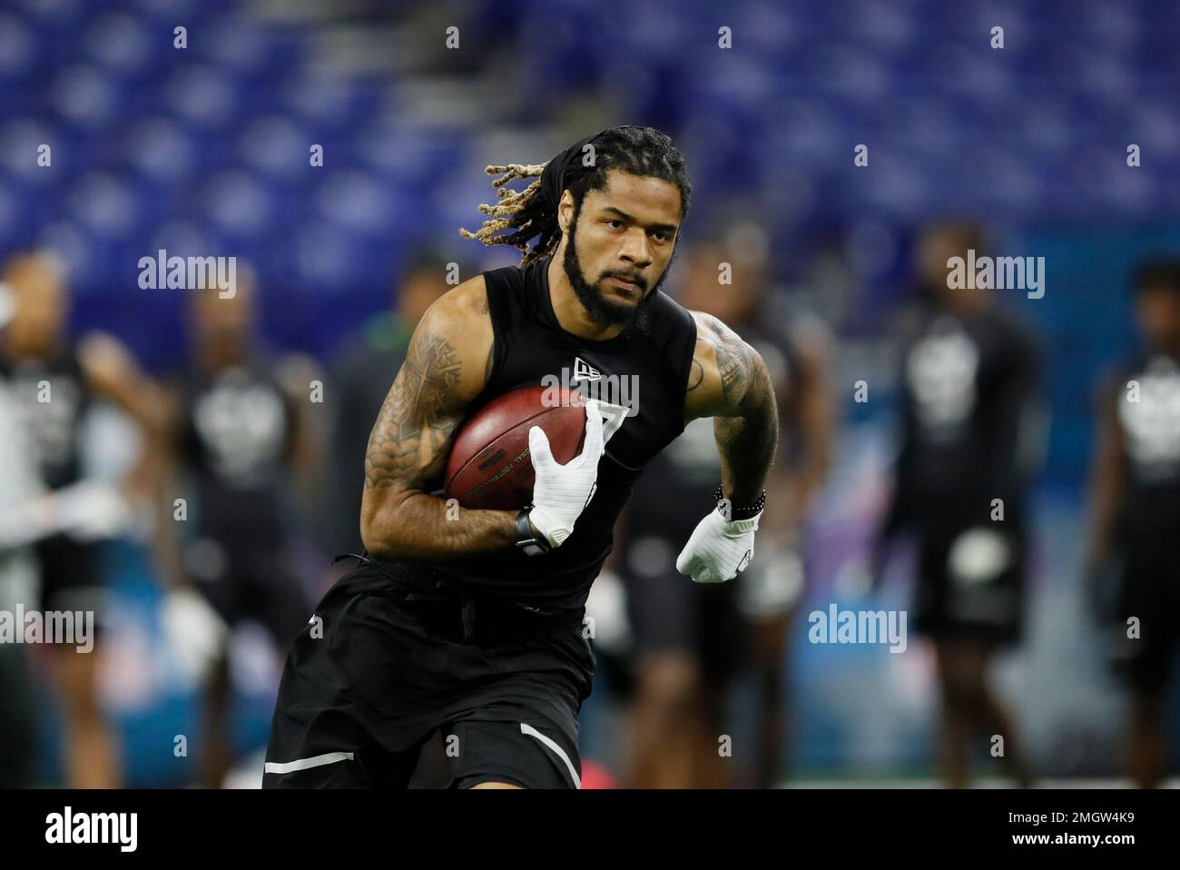 Texas A&M wide receiver Kendrick Rogers runs a drill at the NFL ...