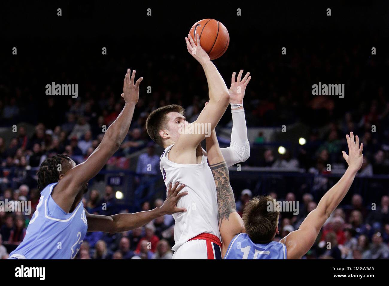 Gonzaga forward Filip Petrusev, center, shoots between San Diego ...