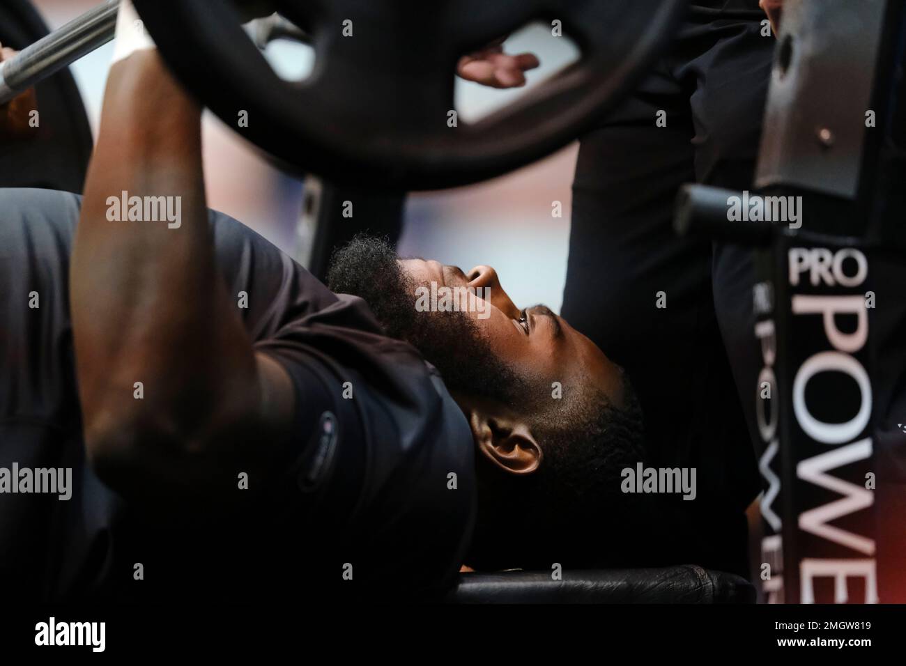 Georgia offensive lineman Andrew Thomas does the bench press at the NFL ...