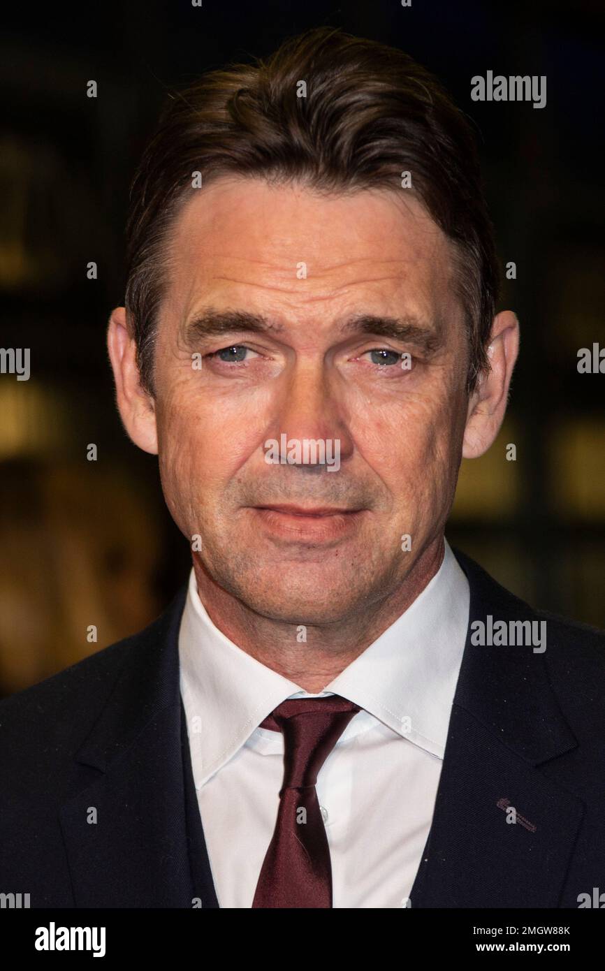 Actor Dougray Scott poses for photographers upon arrival at the UK ...