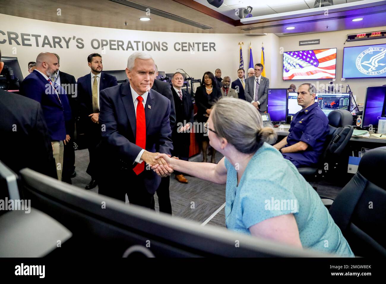 Vice President Mike Pence shakes hands with a worker as he tours the ...