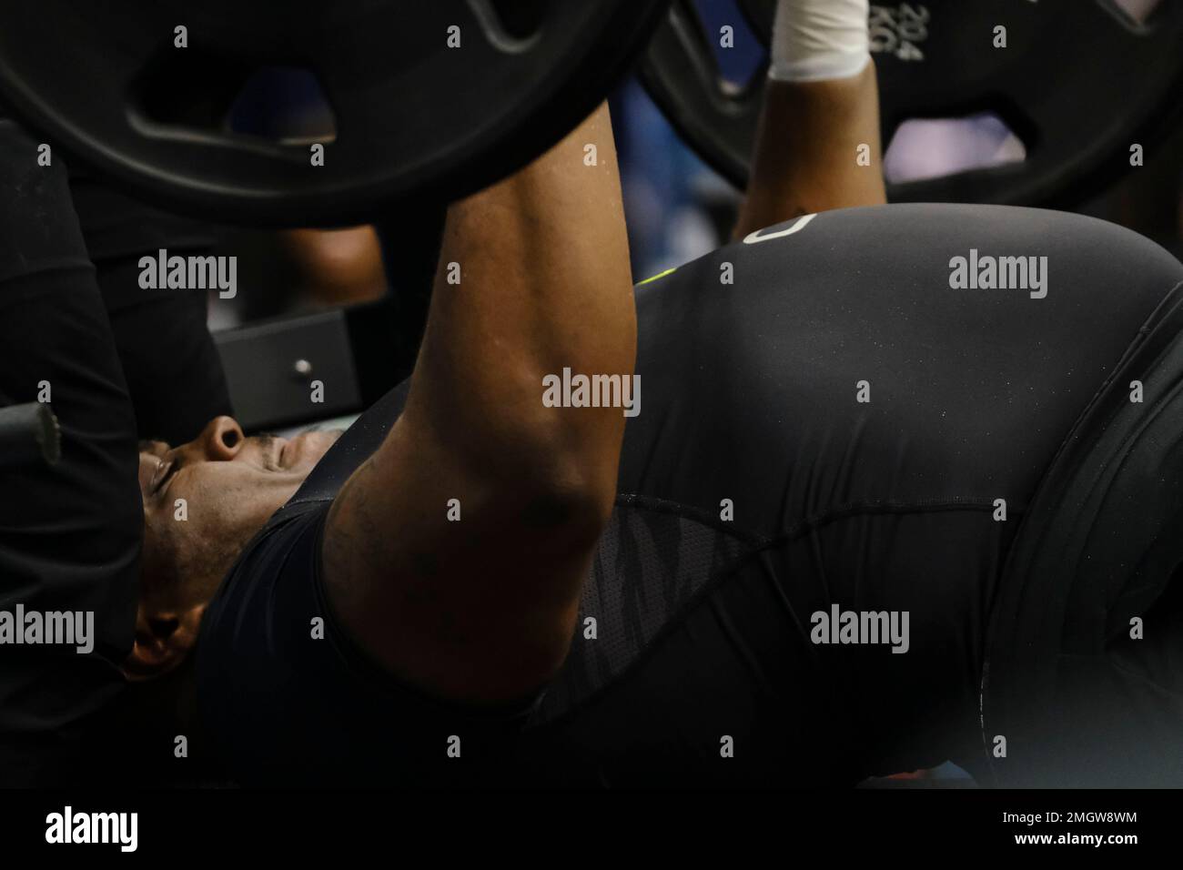 Clemson offensive lineman Tremayne Anchrum does the bench press at the ...