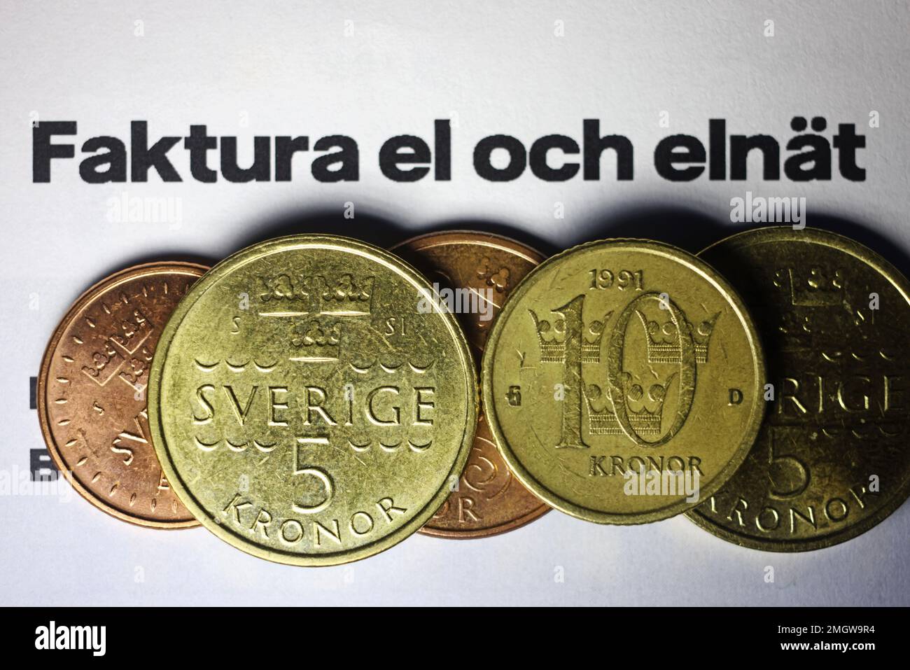 Swedish coins on an invoice from the electricity network company ...