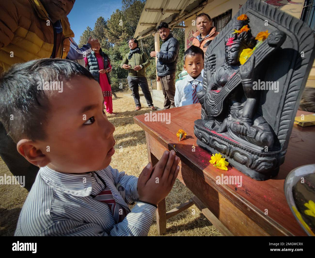 Kathmandu, Bagmati, Nepal. 26th Jan, 2023. A child offers prayers to an ...