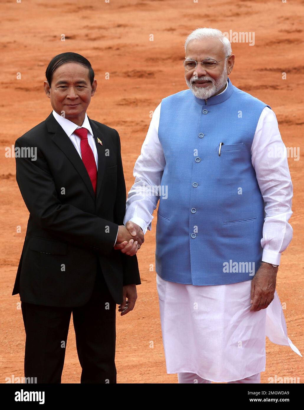 Indian Prime Minister Narendra Modi, right, shakes hand with Myanmarese ...
