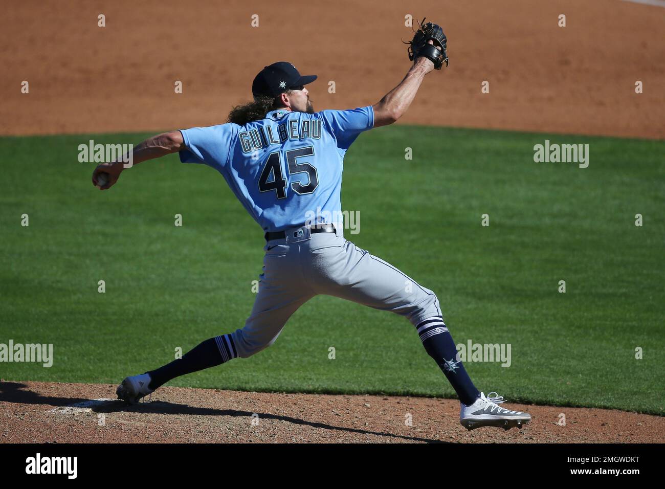 Seattle Mariners relief pitcher Taylor Guilbeau throws a pitch against ...