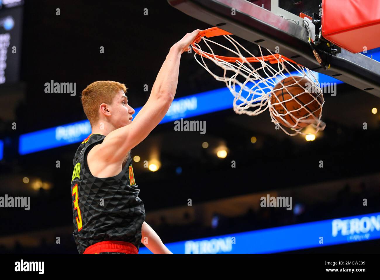 Atlanta Hawks guard Kevin Huerter dunks during an NBA basketball game ...
