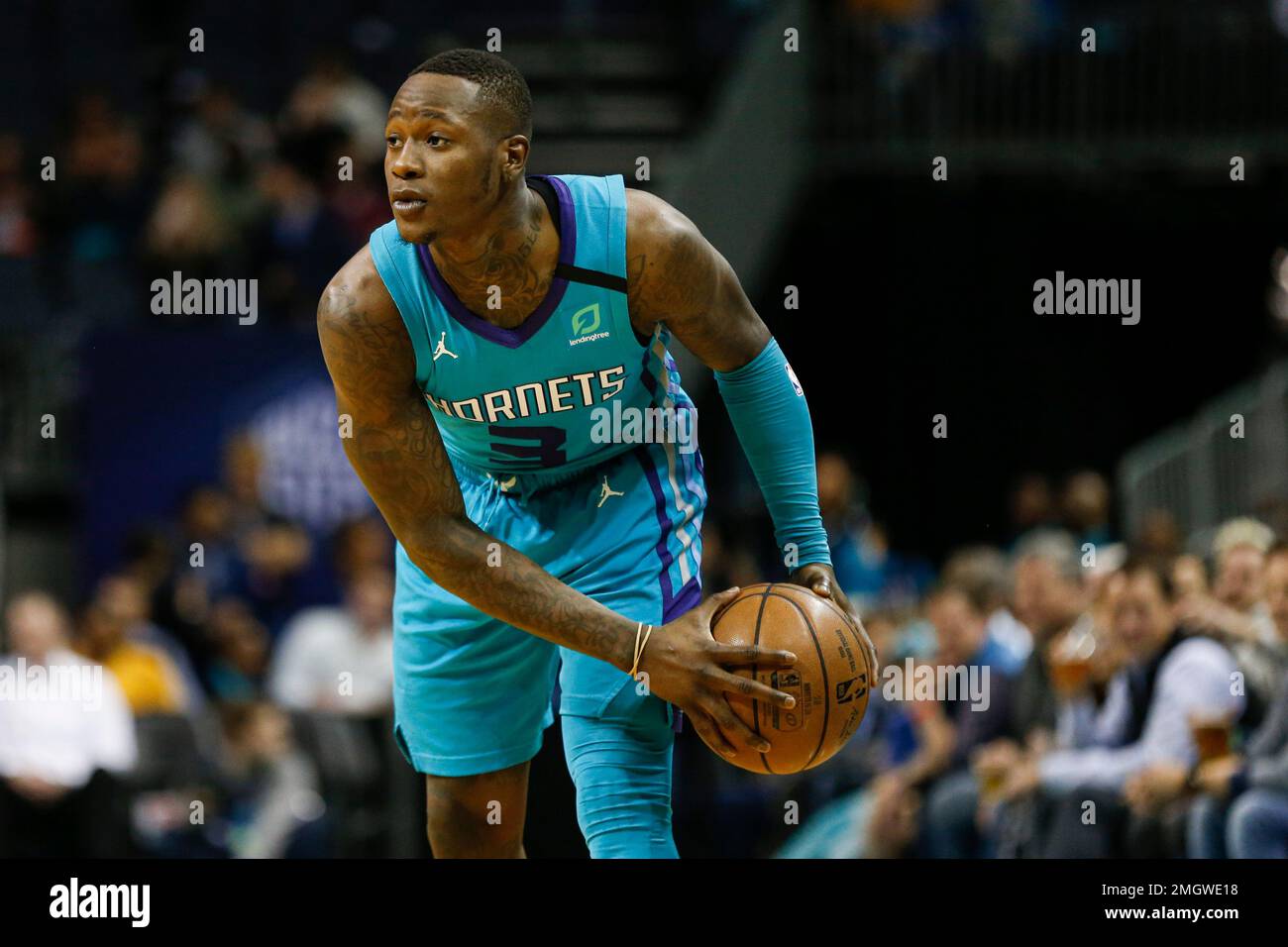 Charlotte Hornets guard Terry Rozier looks to pass against the New York ...