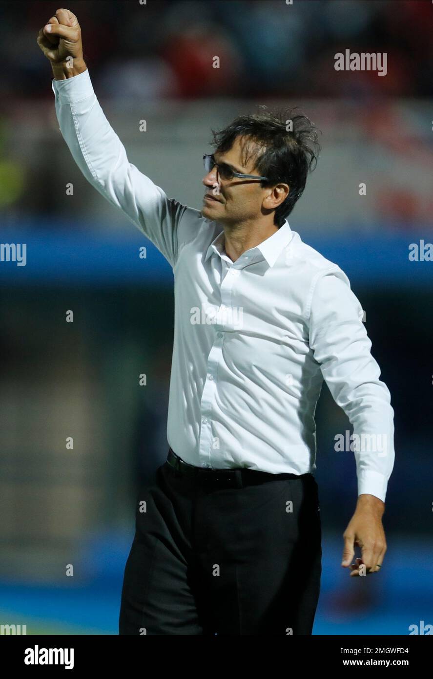 Coach Fabian Bustos of Ecuador's Barcelona celebrates a goal against ...
