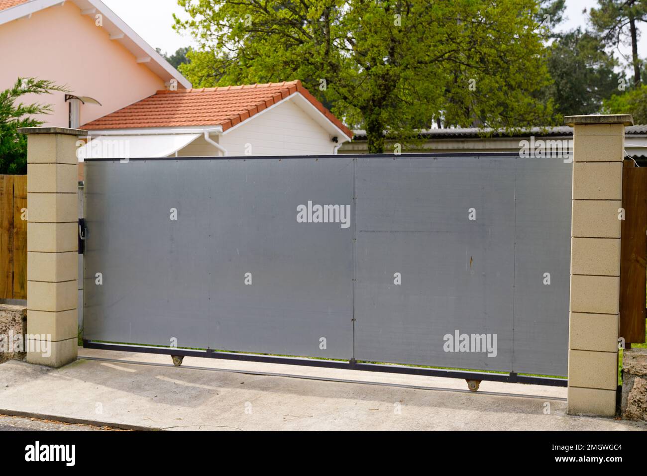 sliding gate steel big grey brut metal portal on modern house street ...