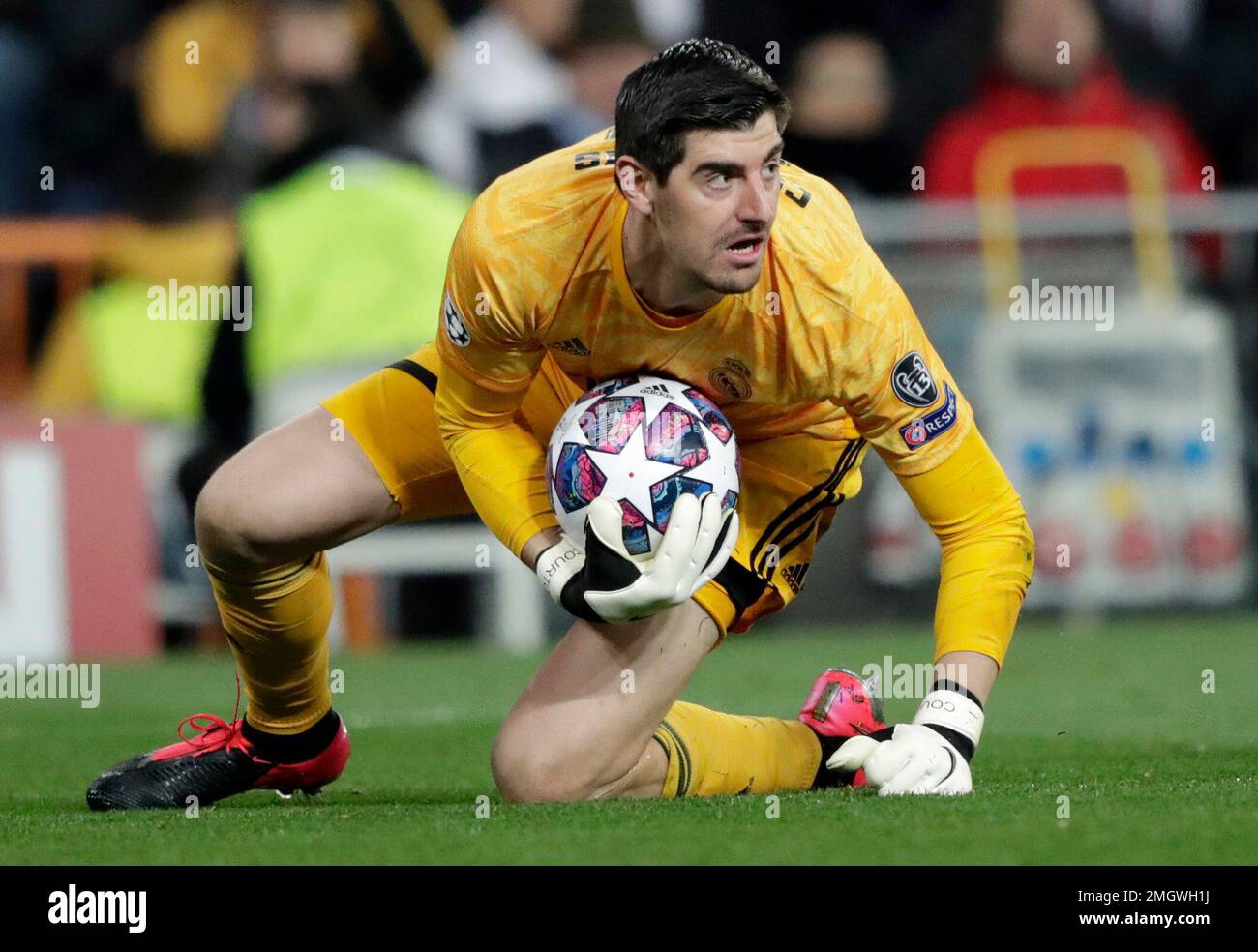 Real Madrid's goalkeeper Thibaut Courtois makes a safe during the round ...
