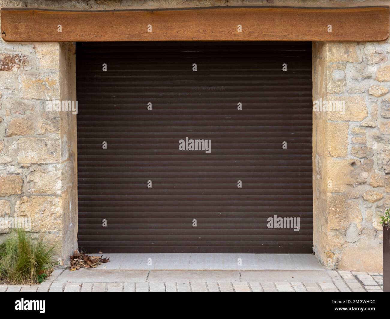 metallic brown roller shutter curtain of facade store closed garage ...